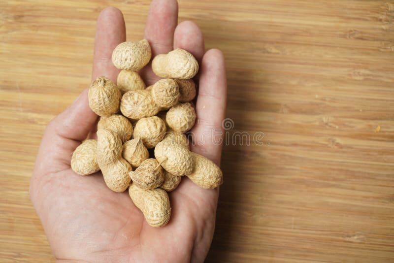 Overhead Shot of Peanuts in a Person S Hand Stock Image - Image of ...