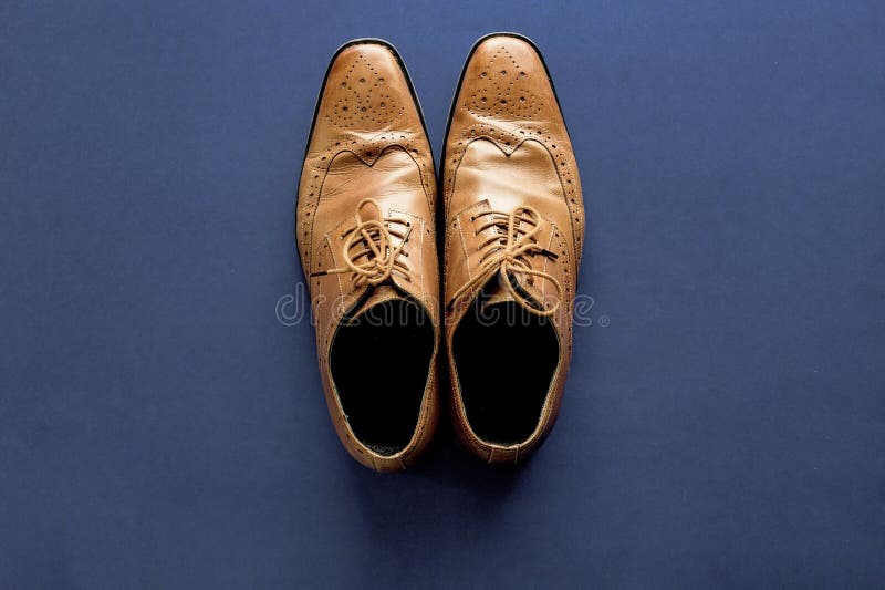 Overhead Shot of Shoes on a Dark Blue Surface Stock Photo - Image of ...