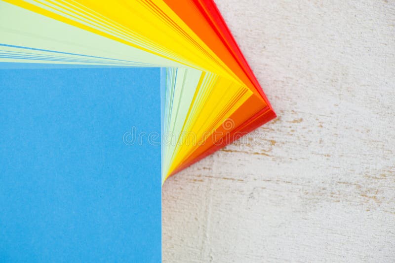 Overhead Shot of a Stack of Colorful Notepad on a White Surface with ...