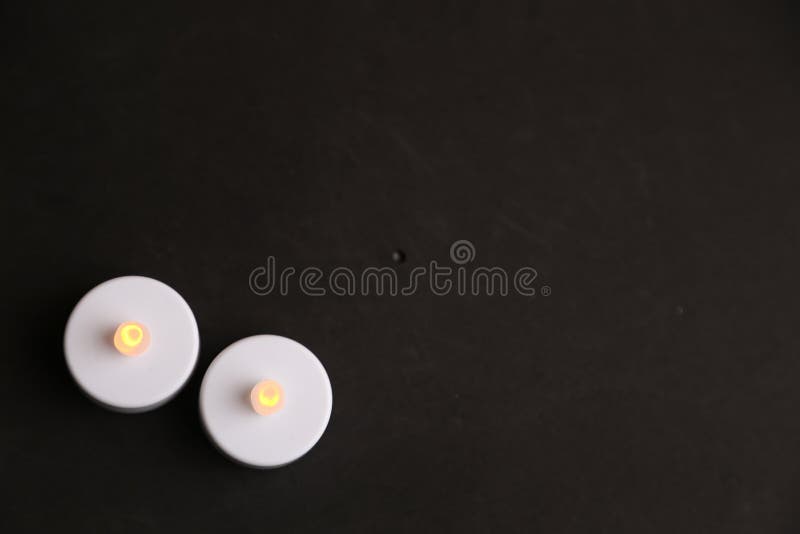 Overhead Shot of White Plastic Led Candles on a Black Surface Stock ...