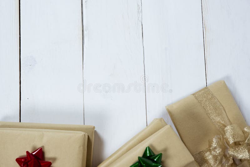 Overhead Shot of a White Wooden Surface with Presents on the Bottom ...