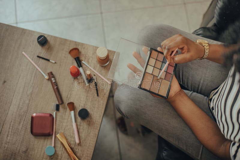Overhead Shot of a Young Female Putting Her Make Up on Stock Image ...
