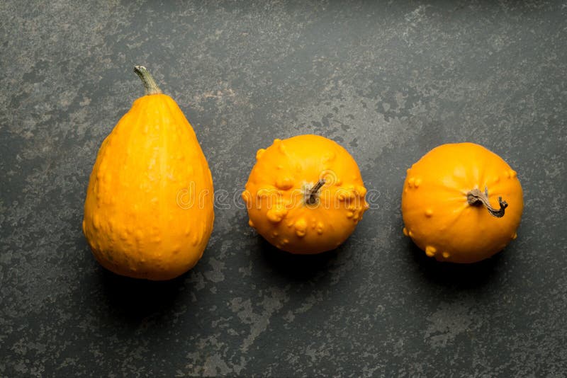 Overhead of Three Yellow Bumpy Squash Stock Image - Image of ...