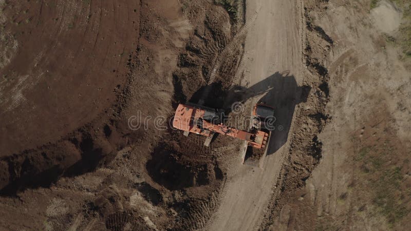 Top View of Excavator Loading the Truck with Clay at Open Pit Stock ...