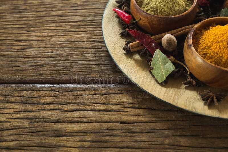 Various spices in plate stock photo. Image of flavor - 99474004