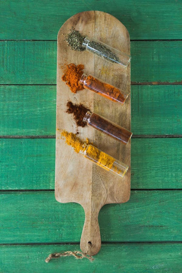 Various Spices Spilling Out of Bottles Stock Photo - Image of people ...