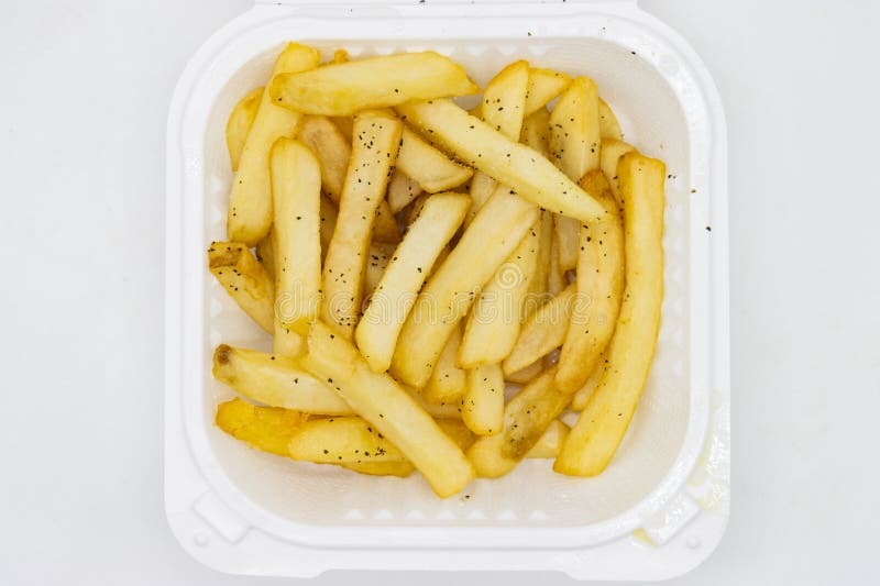 Basic French Fries with Pepper in a White Container Stock Image - Image ...