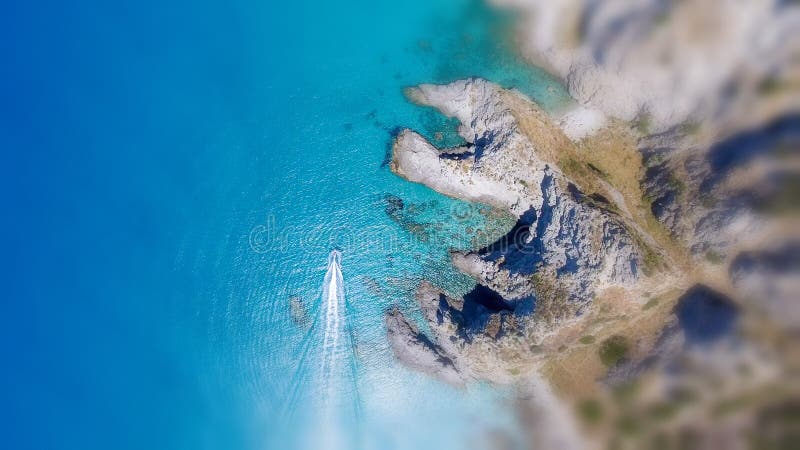 Overhead View of Beautiful Rocks Over Crystal Clear Ocean Stock Image ...
