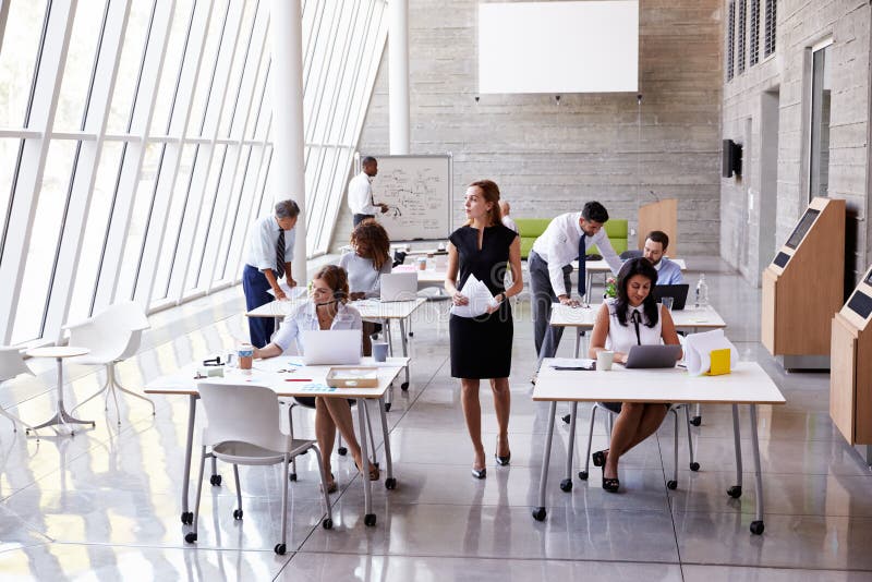 Overhead View of Businesspeople Working at Desks in Office Stock Image ...
