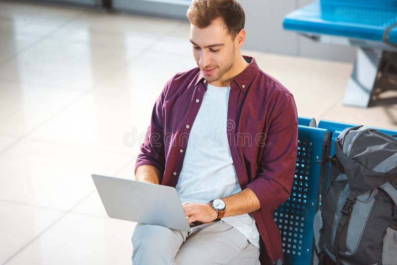Overhead View of Cheerful Man Using Laptop while Sitting Stock Photo ...