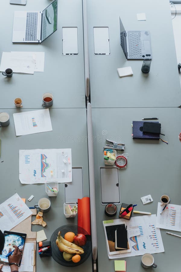Overhead View of a Collaborative Workspace Featuring Two Laptops ...
