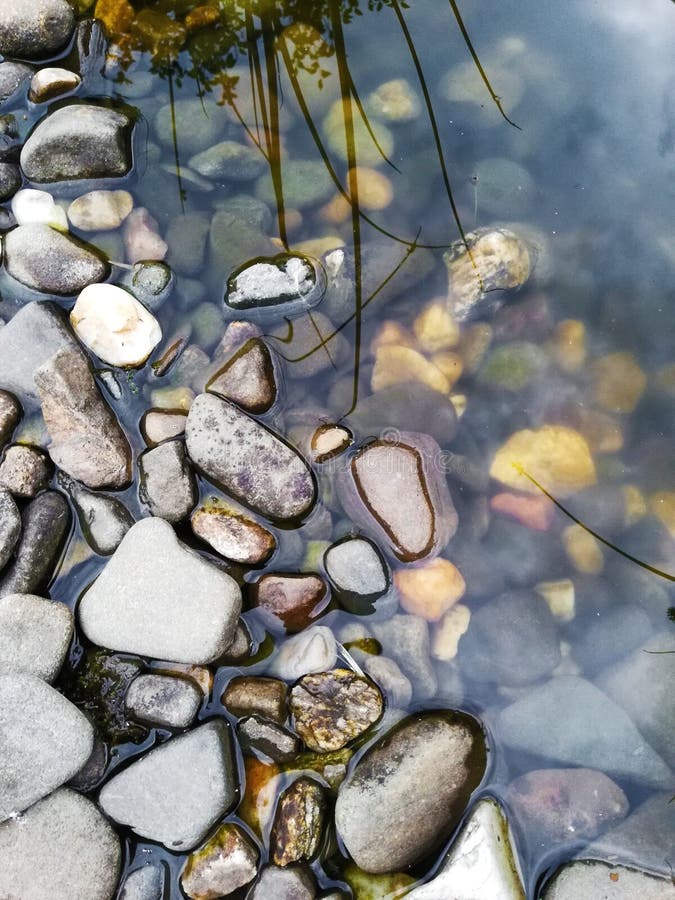 Colorful Smooth Pebbles in Water Stock Image - Image of colorful ...