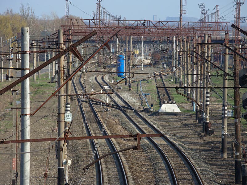 Overhead View of a Complex Railway Yard with Multiple Tracks, a Small ...
