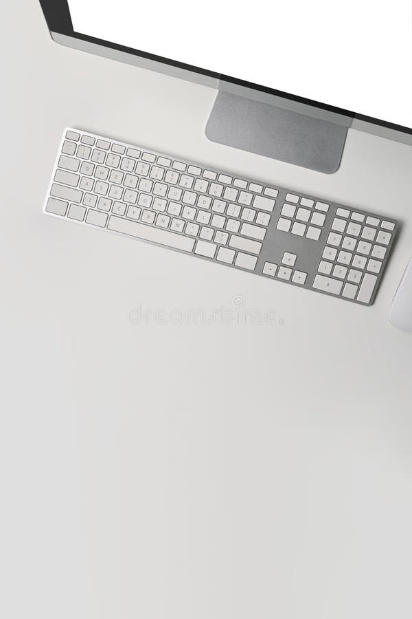 Overhead View Computer and Wireless Keyboard on White Table. Stock ...