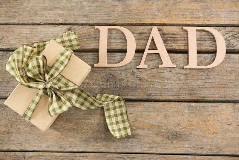 Overhead View of Dad Text with Gift Box Stock Image - Image of tied ...