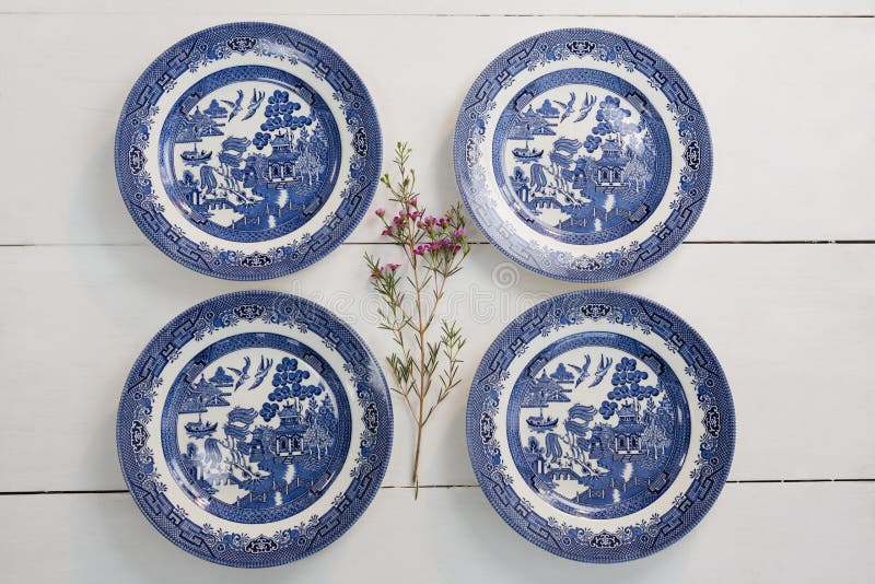 Empty Plates and Flower on White Background Stock Photo - Image of ...