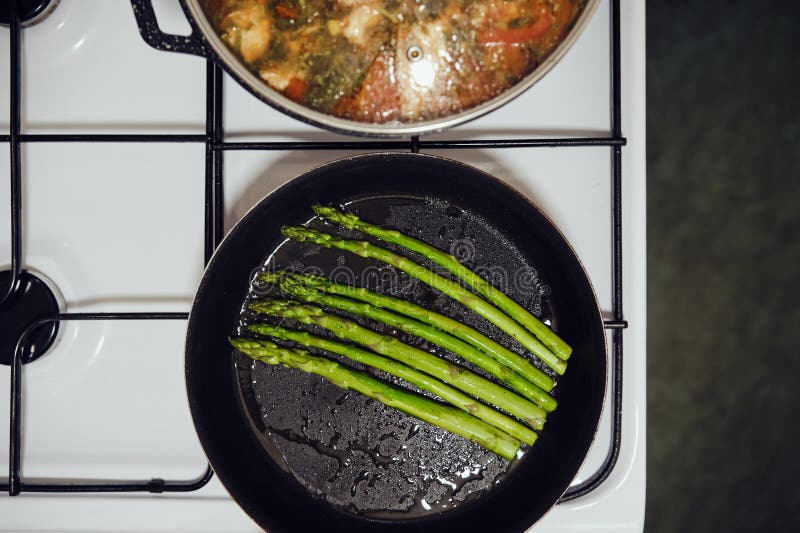 Overhead View of Frying Pan with Asparagus Stock Photo - Image of ...