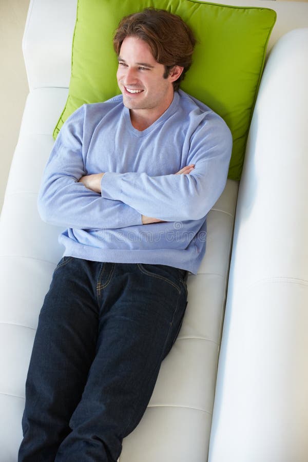 Overhead View of Man Relaxing on Sofa Stock Image - Image of twenties ...