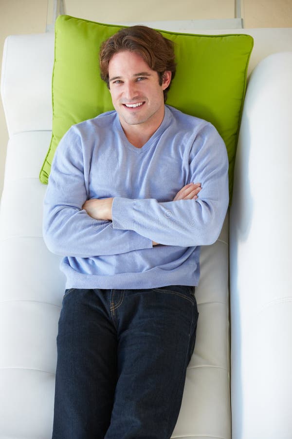 Overhead View of Man Relaxing on Sofa Stock Image - Image of hispanic ...