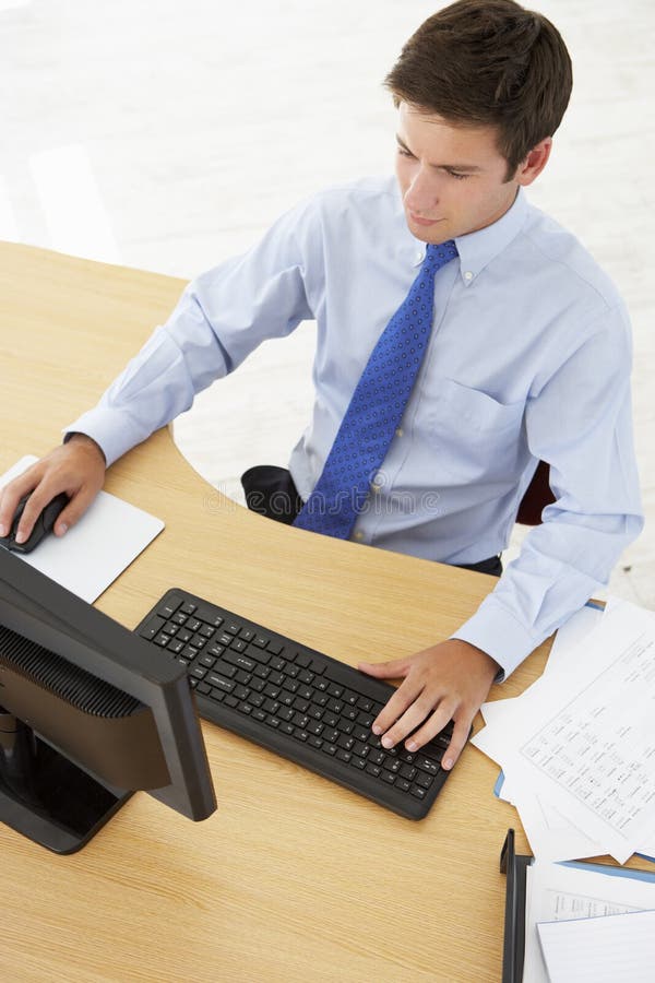 Overhead View of Man Working at Desk Stock Photo - Image of vertical ...