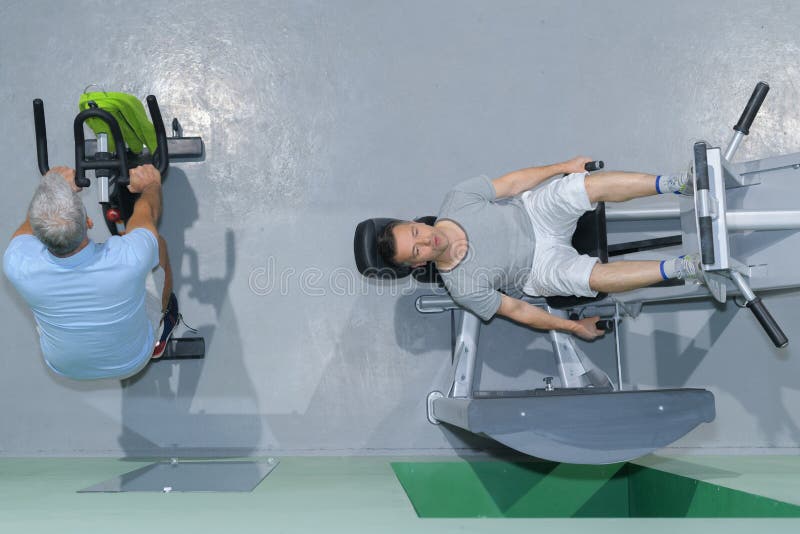 Overhead view men in gym stock image. Image of grey, floor - 93280273