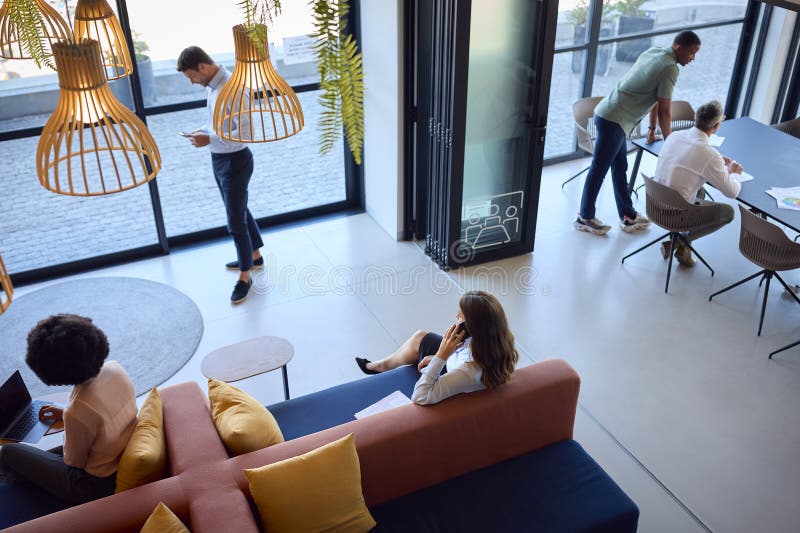 Overhead View of Modern Open Plan Office with Staff Working Around ...