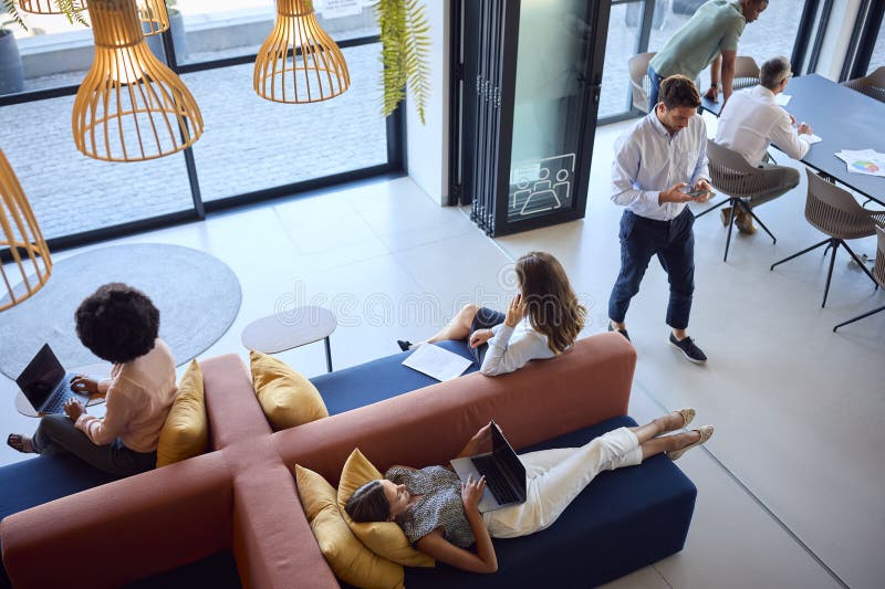 Overhead View of Modern Open Plan Office with Staff Working Around ...