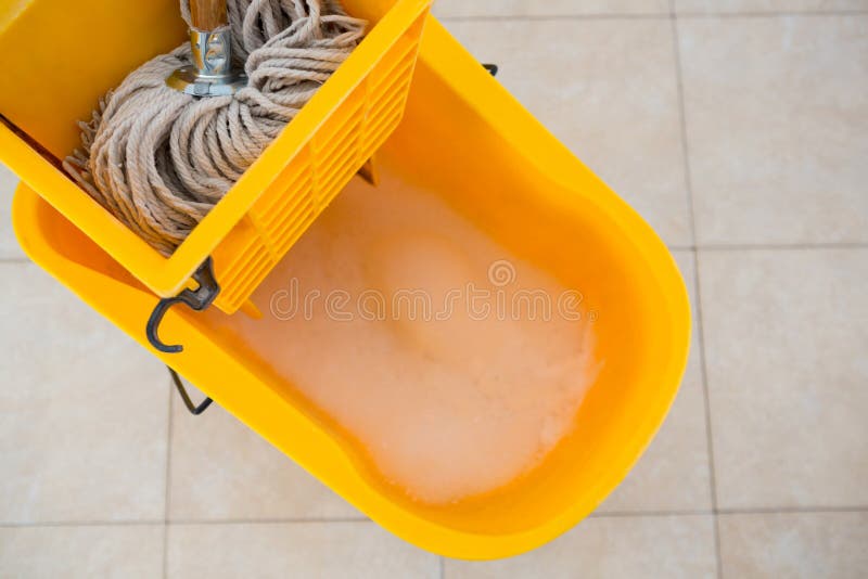 Overhead View of Mop Bucket Stock Image - Image of yellow, flooring ...