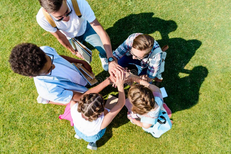 Teenage Classmates Reading Book in Library Stock Image - Image of ...