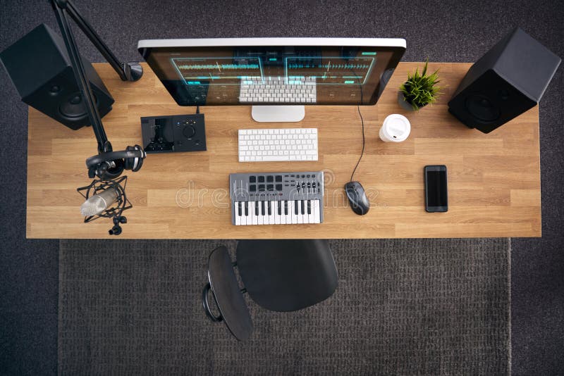 Overhead View of Music Workstation with Keyboard and Microphone in ...