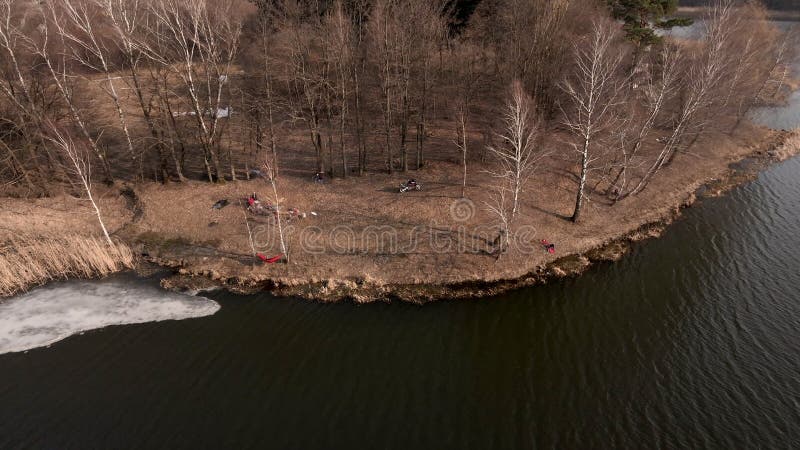 Overhead View of People Resting at the Beach of Early Spring Lake Stock ...