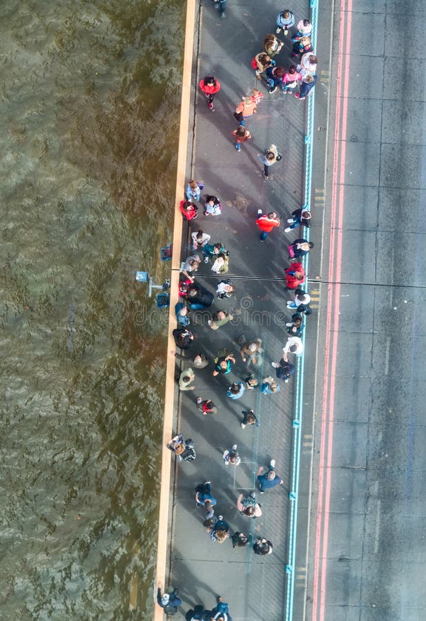 Overhead View of People Walking Over a Bridge Stock Image - Image of ...