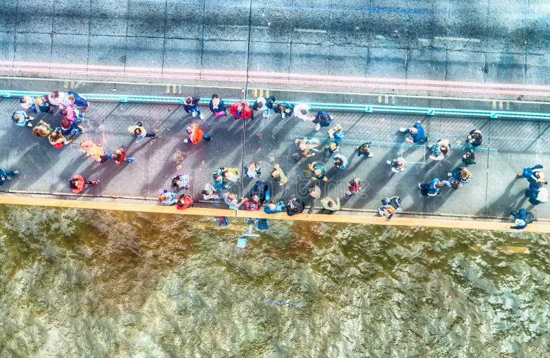 Overhead View Of People Walking Over A Bridge Stock Image - Image of ...