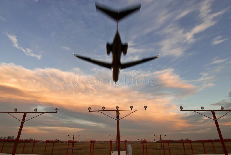 Overhead View of Plane Landing Stock Image - Image of clouds, aircraft ...