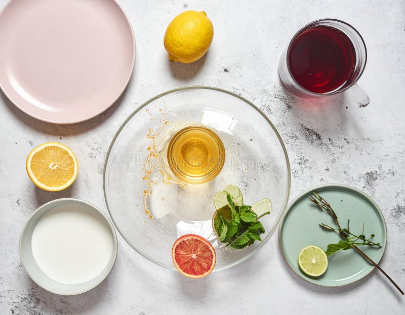 Overhead View of Refreshing Drinks with Citrus Fruits and Plates on ...
