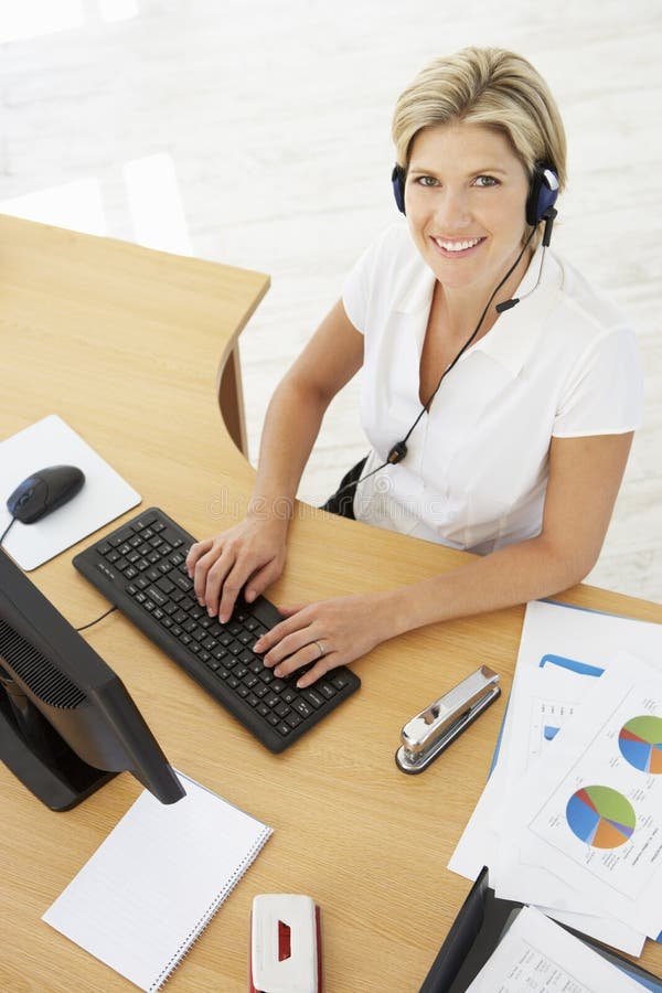 Overhead View of Service Agent Talking To Customer in Call Centre Stock ...