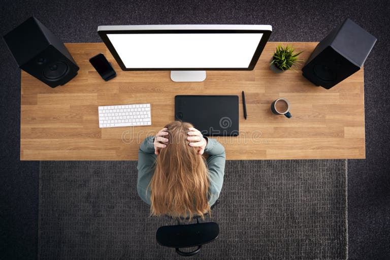 Overhead View of Stressed Female Graphic Designer at Computer with Head ...