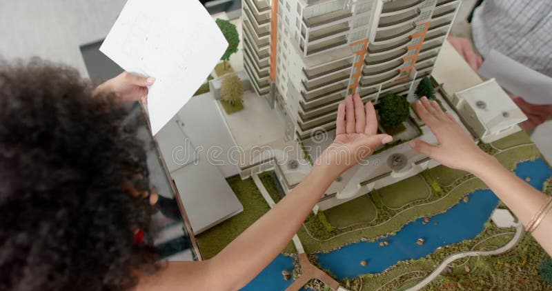 Overhead View of Team of Diverse Architects Discussing Over a 3d ...
