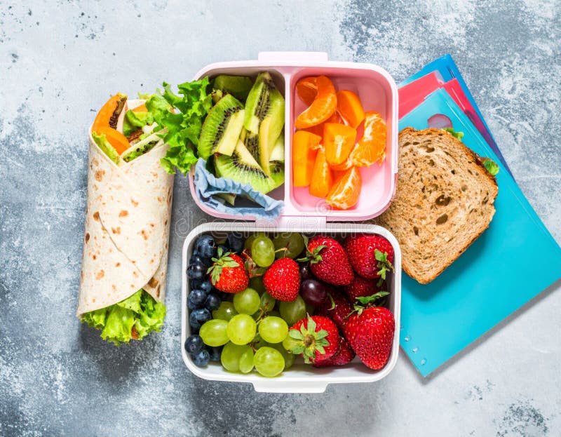 Overhead View of Vibrant Healthy Lunchbox with Fruits and Wrap on Table ...