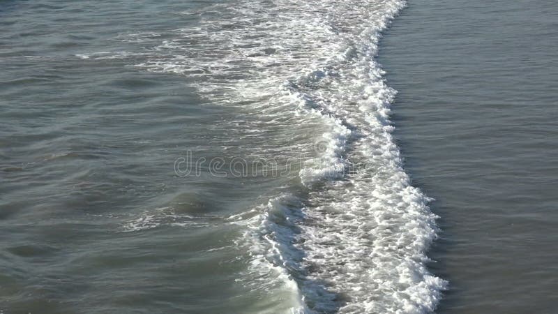 Overhead View of a Wave Rolling To Shore with Ocean Sounds Stock Video ...
