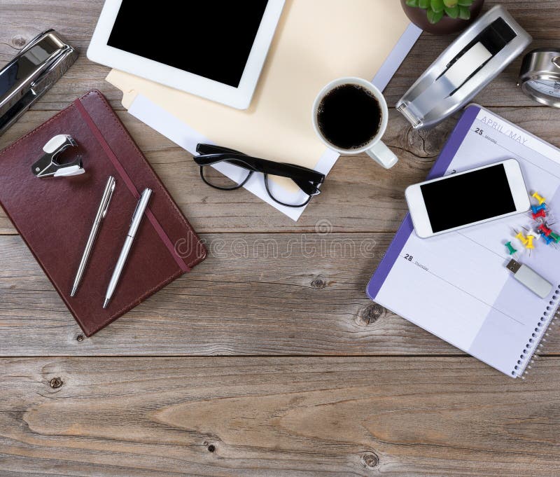 Overhead View of a Working Desktop on Rustic Wood Setting Stock Image ...
