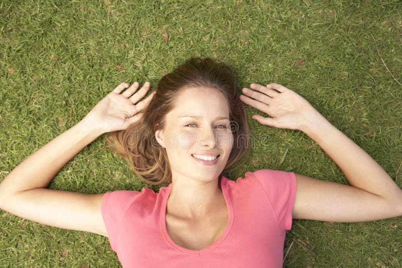 Overhead of Woman Lying on Grass Stock Photo - Image of high, eyes ...