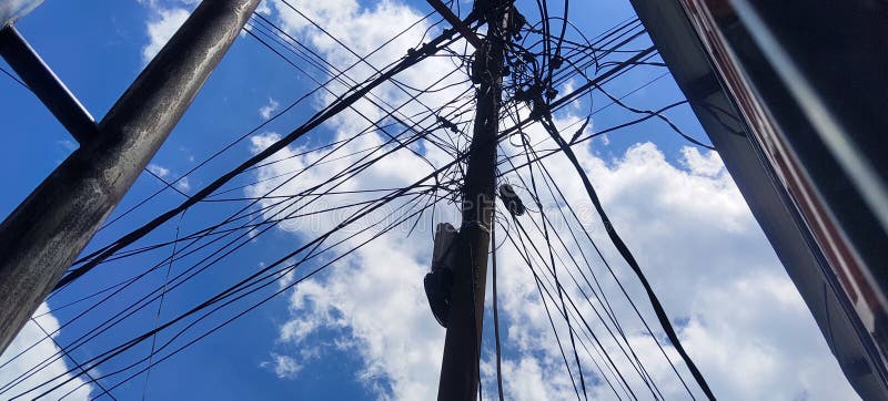 Overhead Wires are Scattered Stock Image - Image of scattered, blue ...