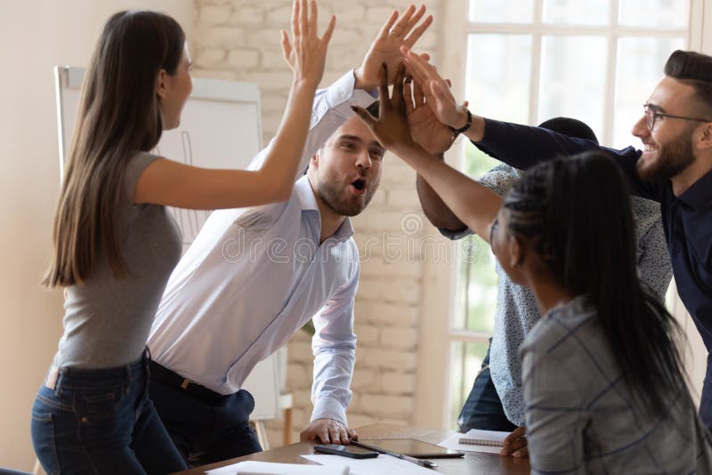 Overjoyed Diverse Employees Give High Five Celebrating Success Stock ... Overjoyed Diverse Employees Give High Five Celebrating Success Stock ...