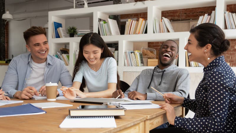Overjoyed Multiracial Students Have Fun Studying Together Stock Photo ...