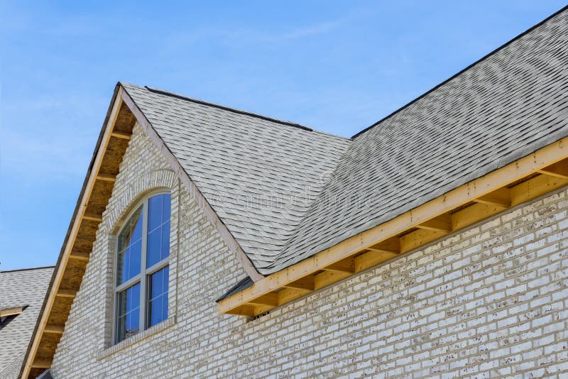 Overlapping Asphalt Shingles on a New Construction Roof Stock Image ...