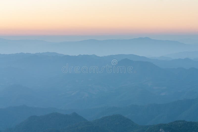 Overlapping Mountains Landscape at the Sunset Stock Photo - Image of ...