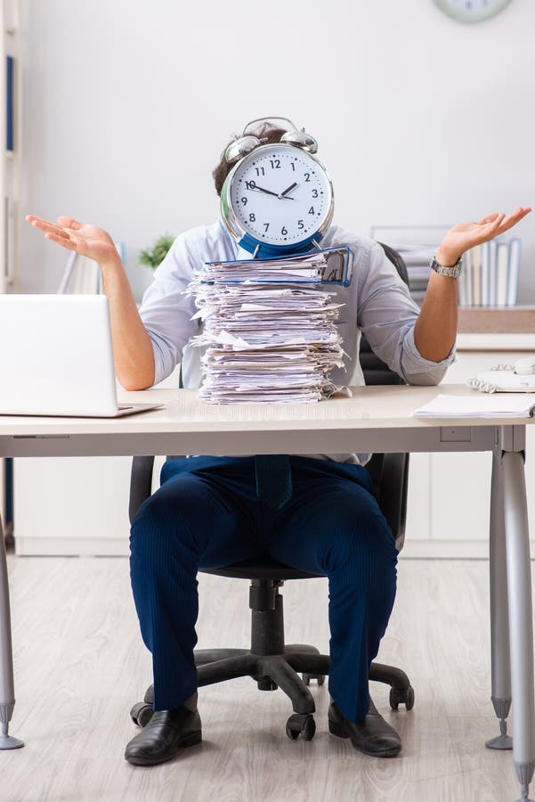 The Overloaded Busy Employee with Too Much Work and Paperwork Stock ...