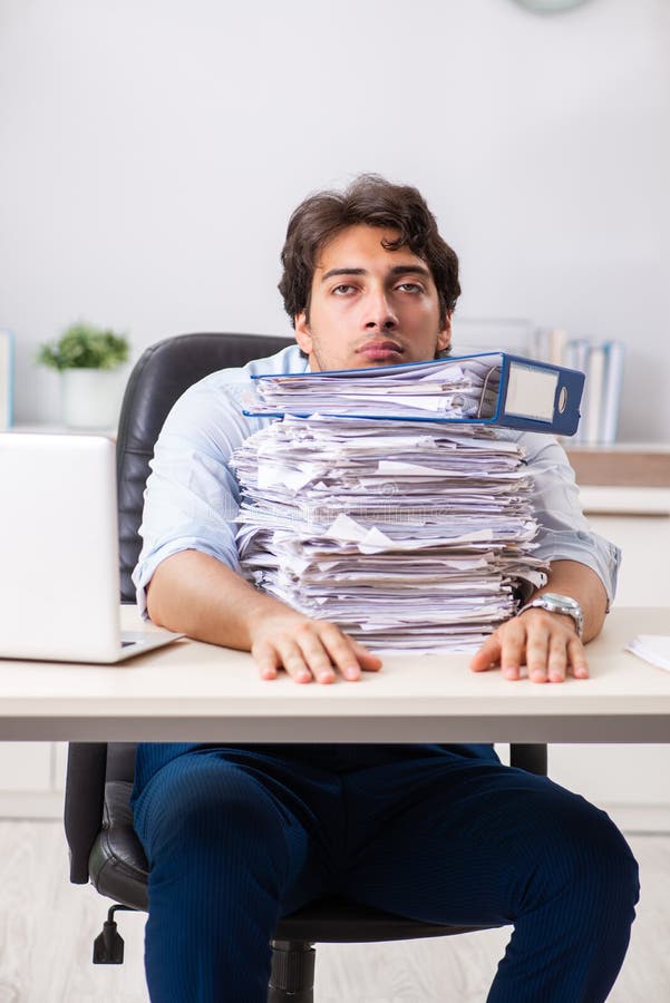 The Overloaded Busy Employee with Too Much Work and Paperwork Stock ...