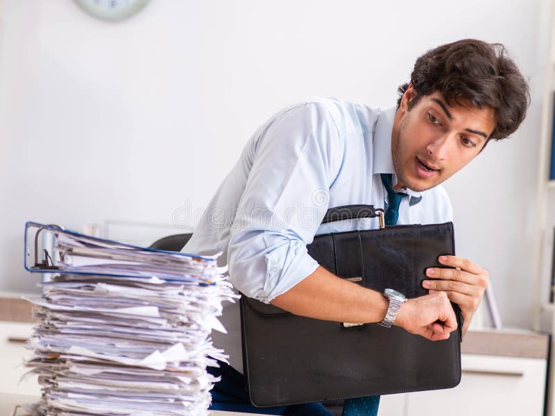 Overloaded Busy Employee with Too Much Work and Paperwork Stock Photo ...